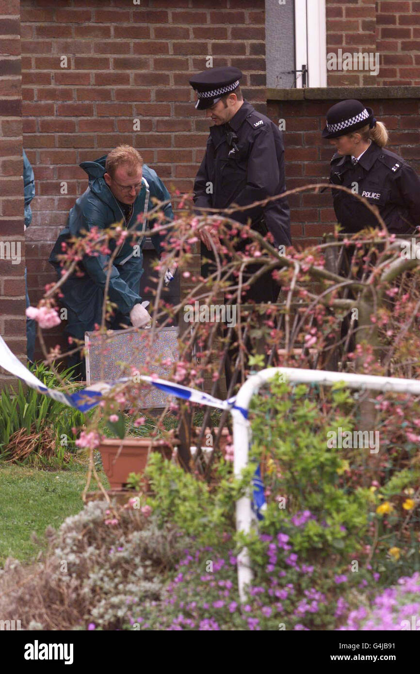 Forensic and uniformed police officers check the scene in Trent Vale ...