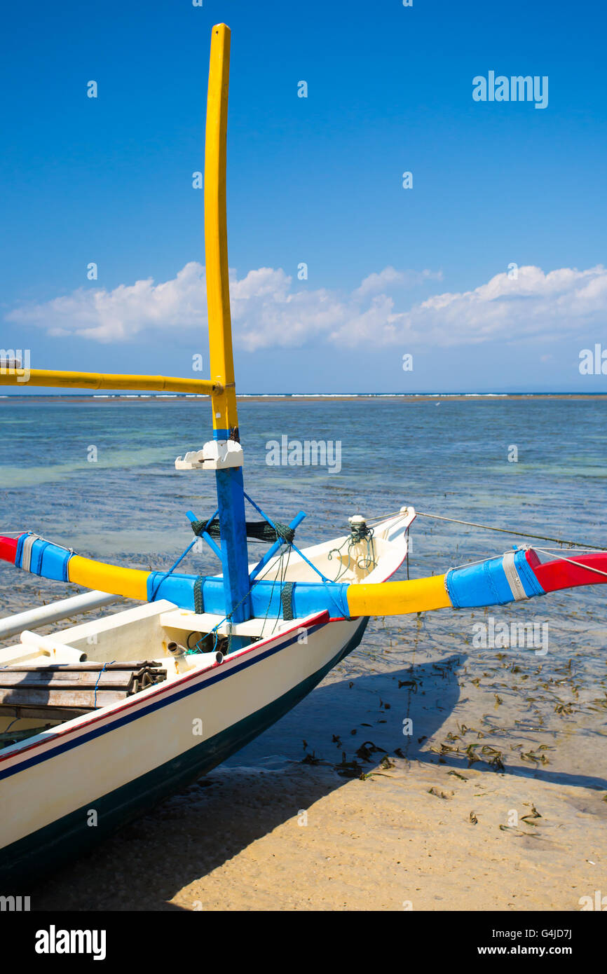 Traditional Balinese boat on a Sanur beach in Bali, Indonesia Stock ...