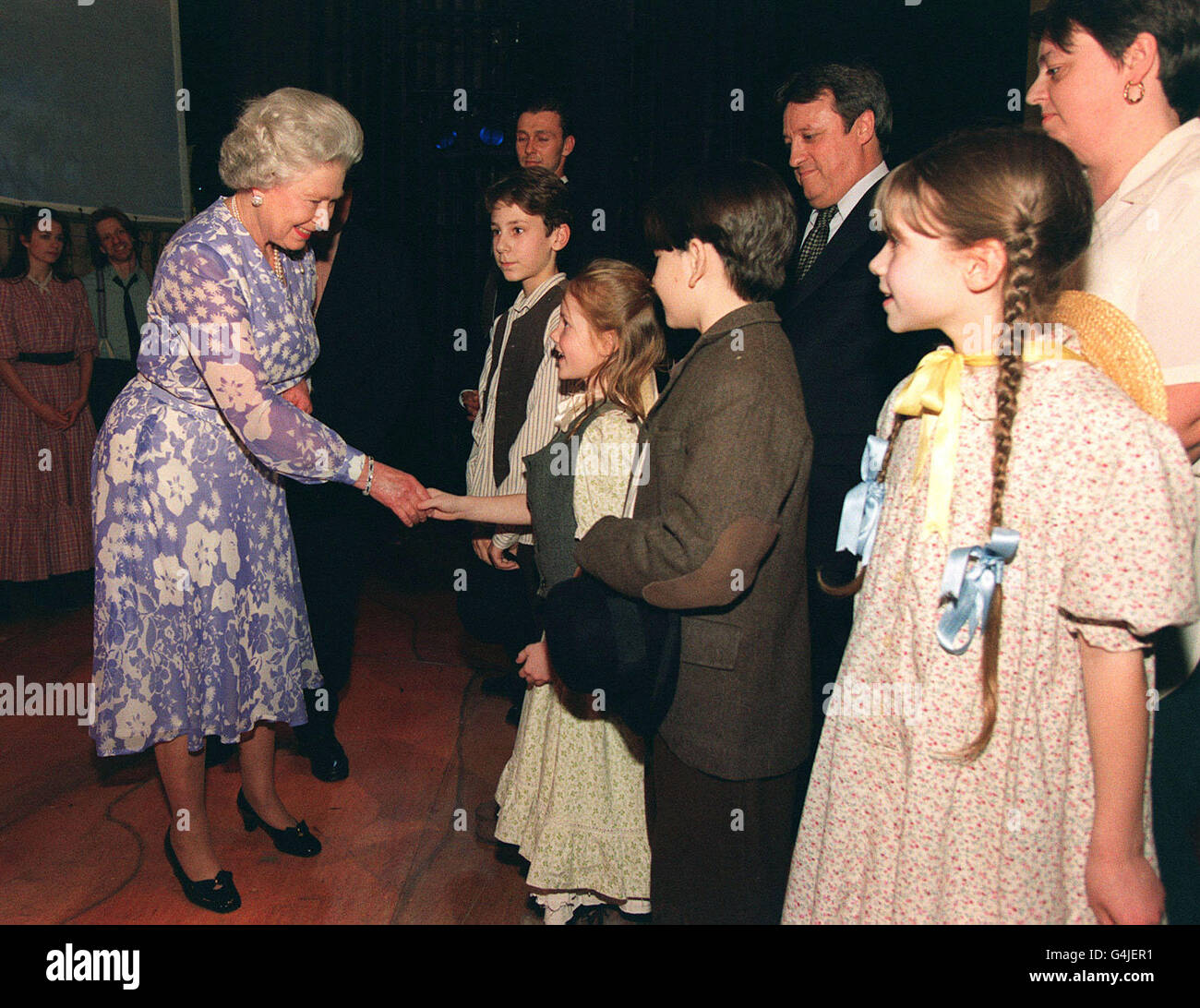 The Queen talks with young cast members from the West-end show ...