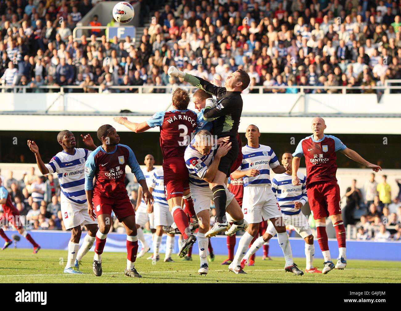 Aston villa goalkeeper shay given centre clears the ball hi-res stock photography and images - Alamy