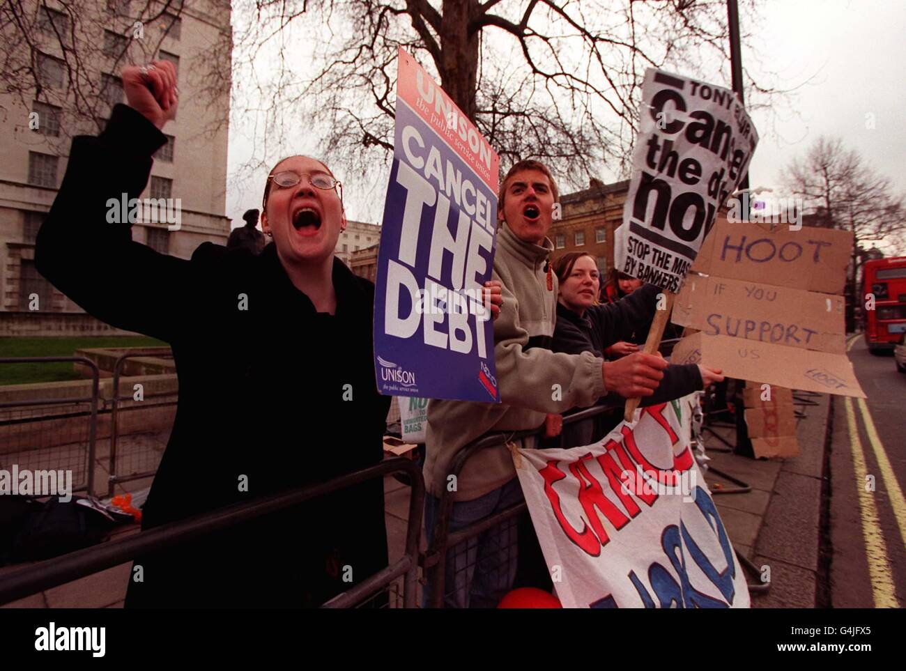 Protestors outside Downing Street in London call for the cancellation ...