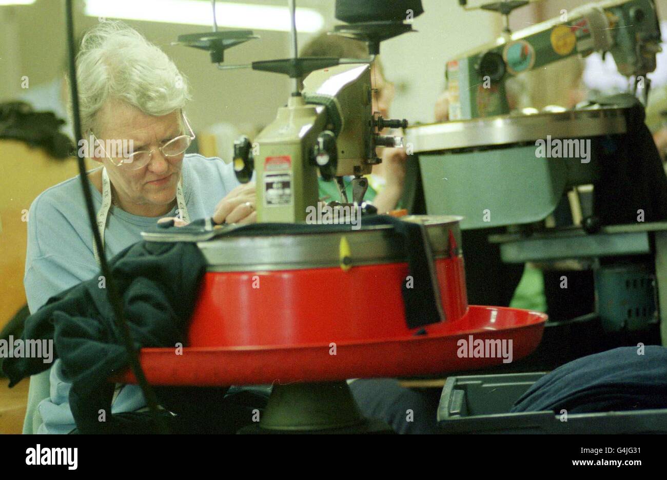 Cashmere factory worker/Scotland Stock Photo - Alamy