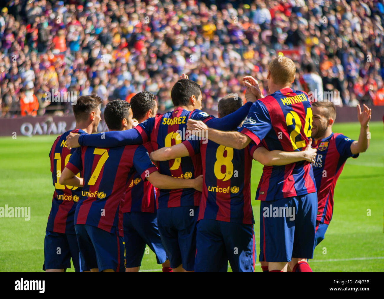 Barcelona players celebrating goal Stock Photo - Alamy