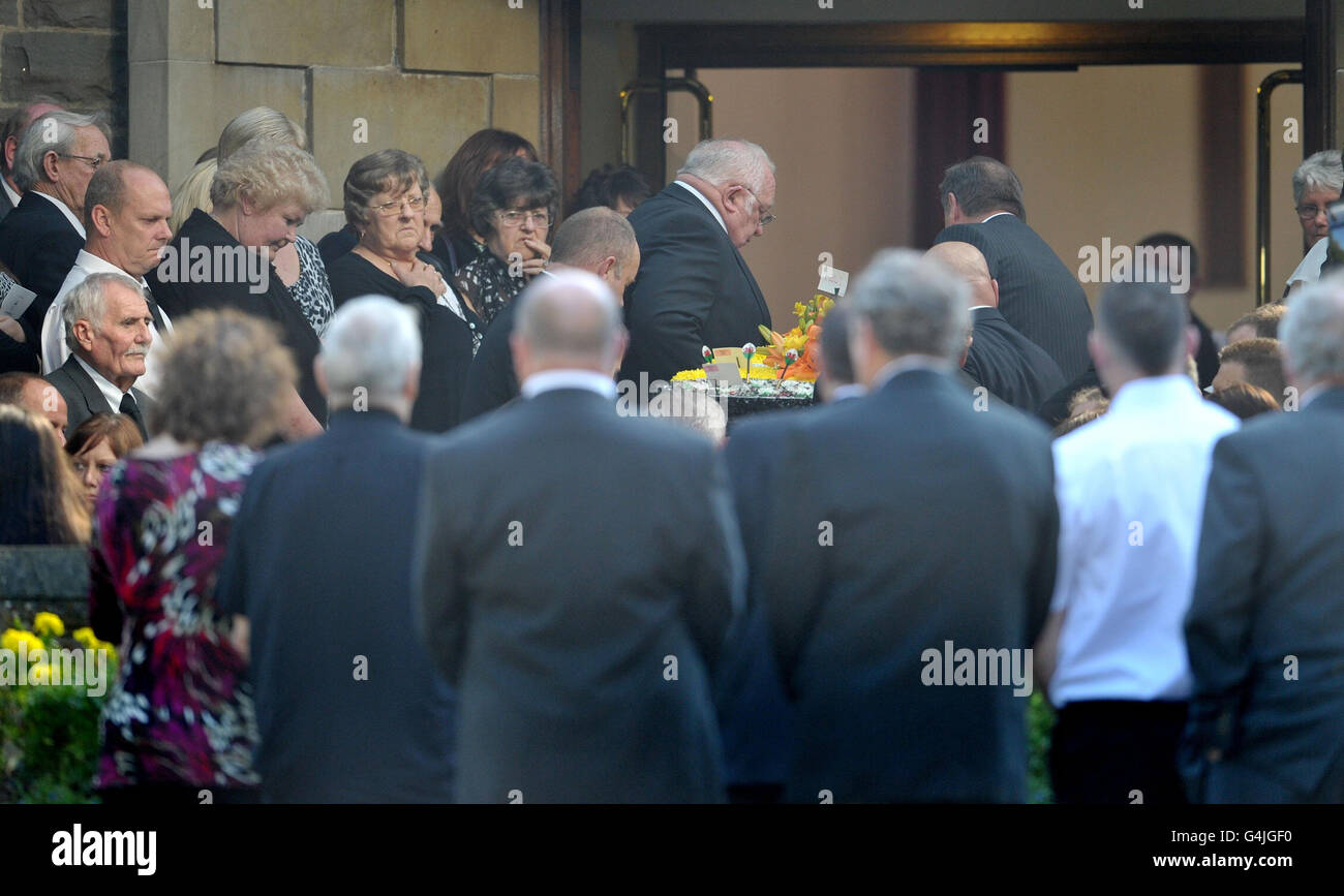The coffin of Charles Breslin, one of the miners who was killed in the ...