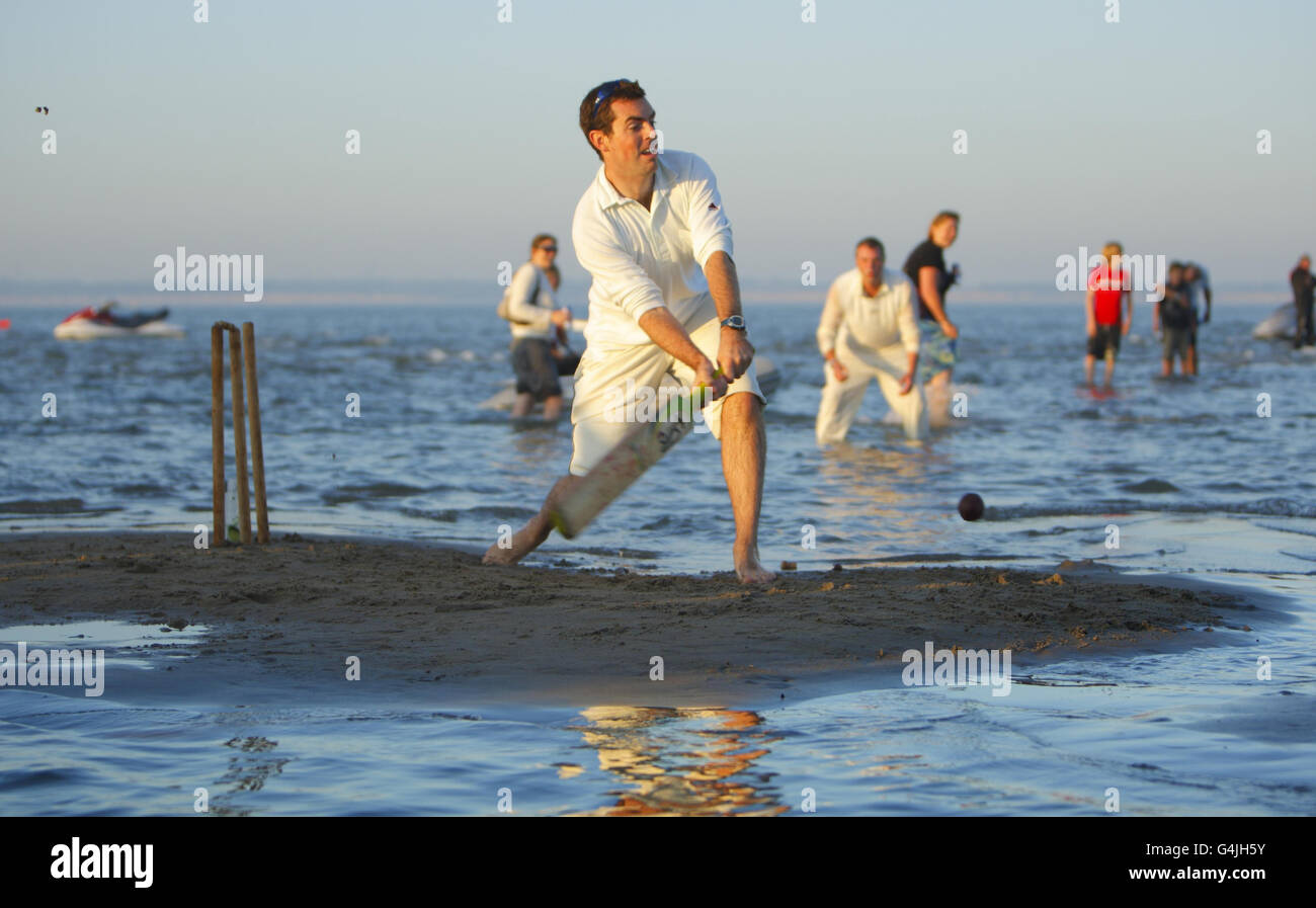 The annual Bramble Bank cricket match Stock Photo - Alamy