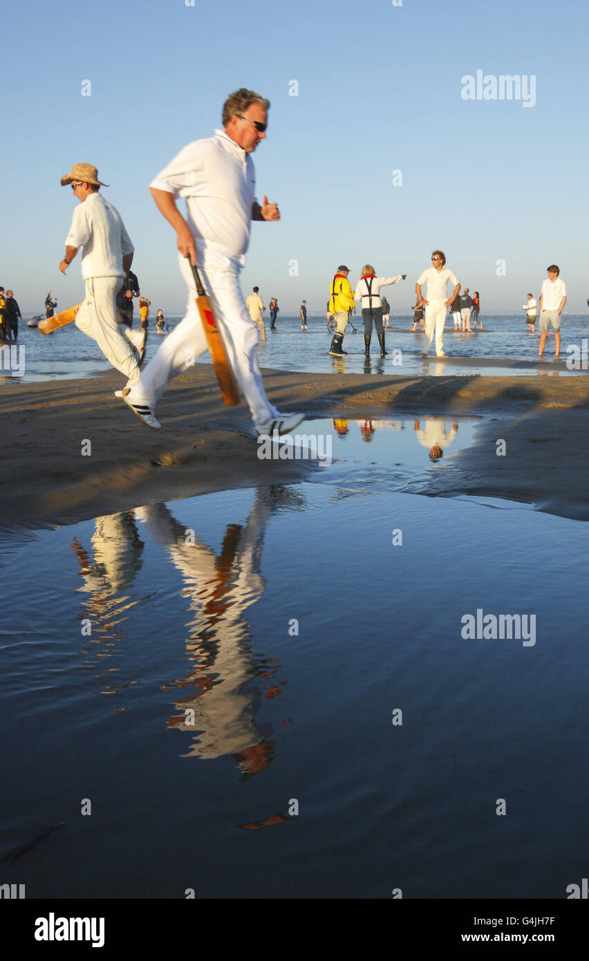 The annual Bramble Bank cricket match Stock Photo - Alamy