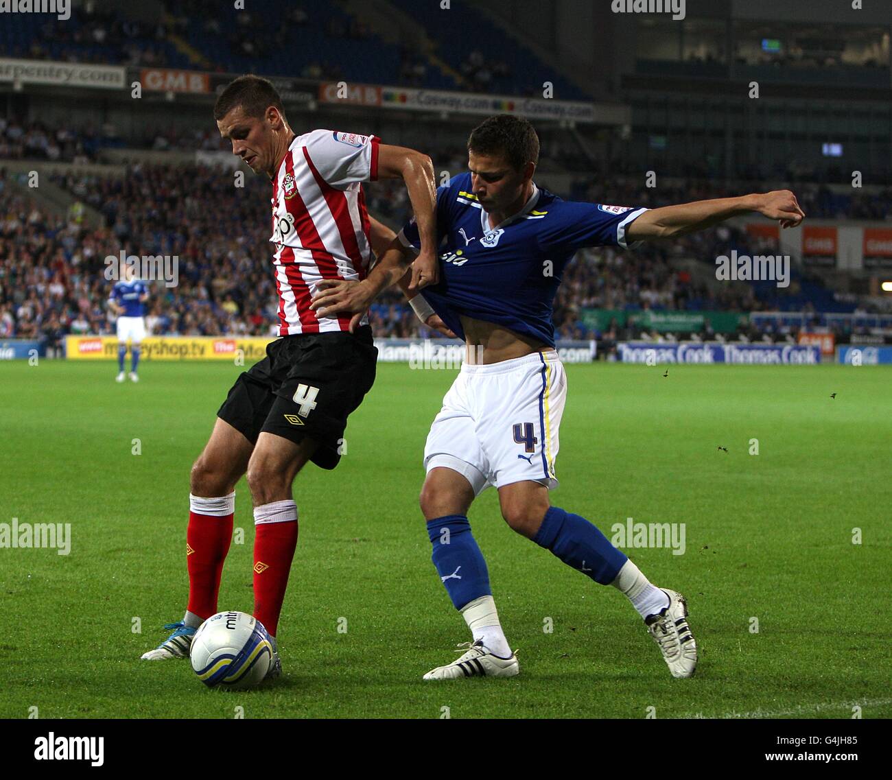 Southampton's Morgan Schneiderlin (left) and Cardiff City's Filip Kiss ...