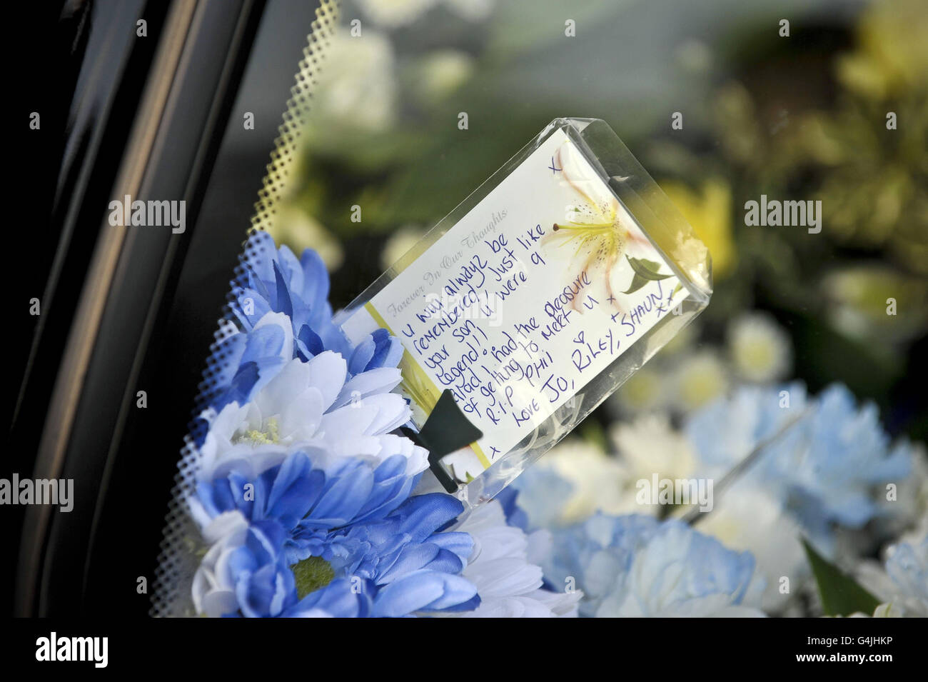 A forever in our memory floral tribute card pictured inside the hearse ...