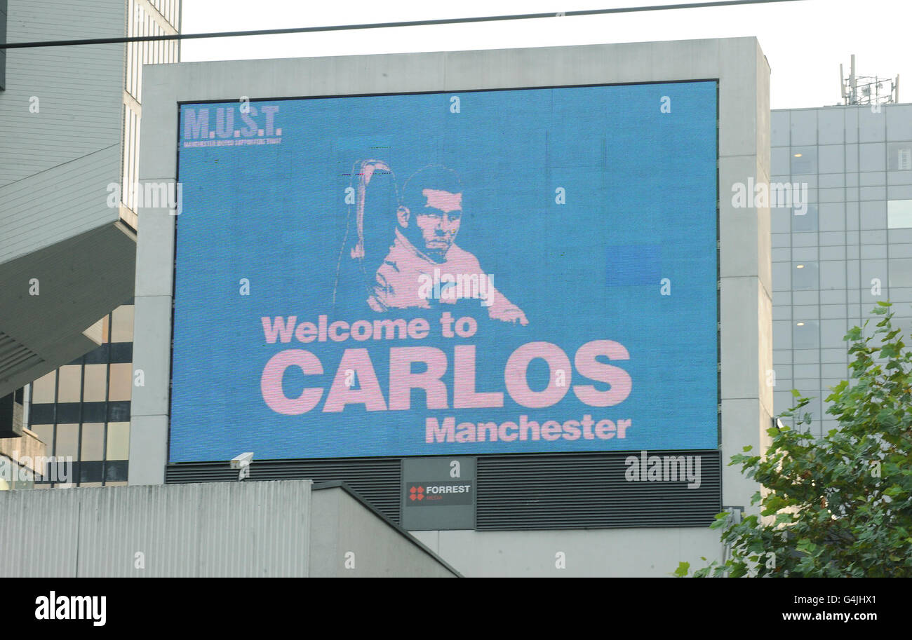 Soccer - Carlos Tevez Billboard - Manchester. A sign saying 'Welcome to ...