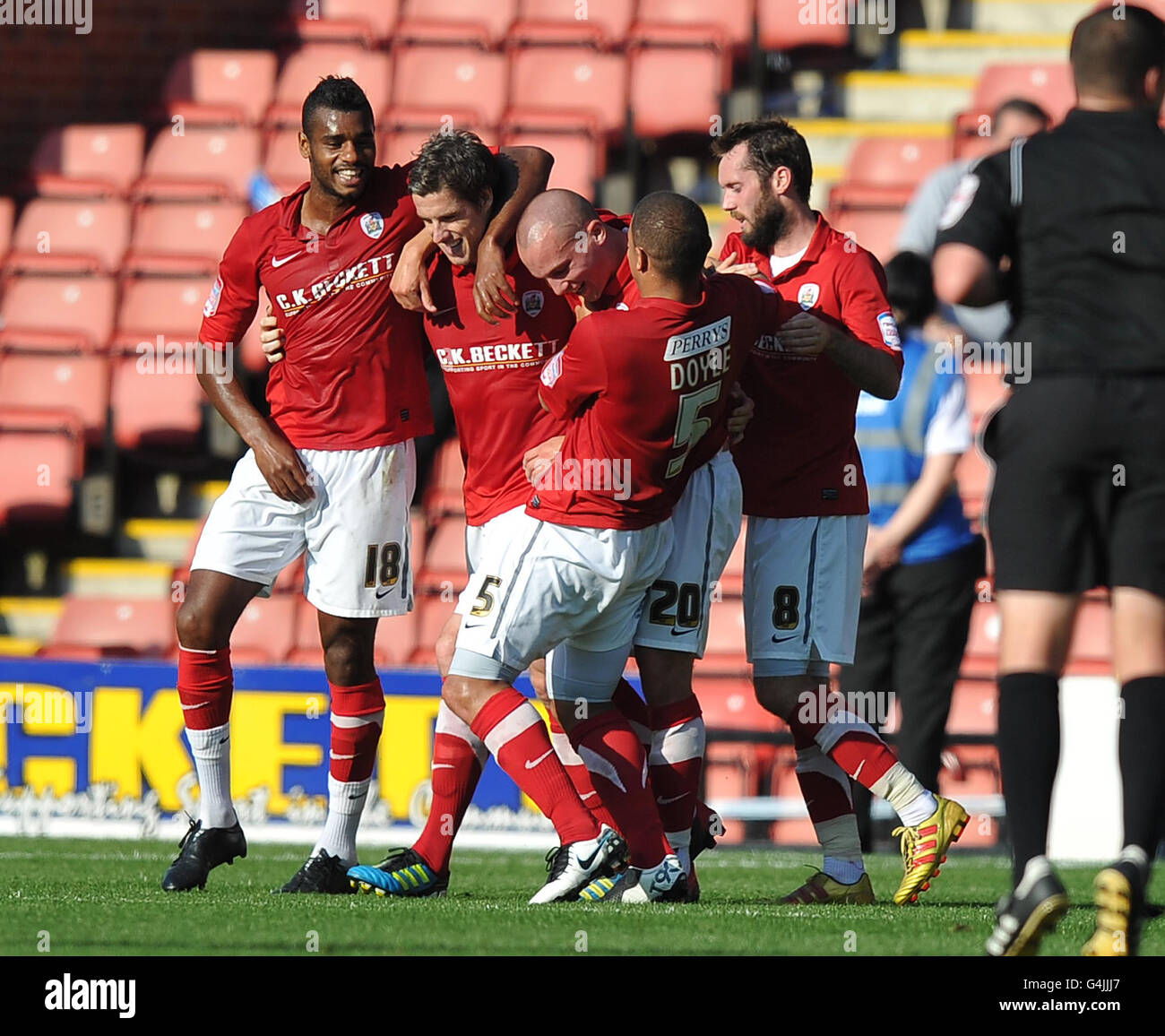 Barnsley's Andy Gray is congratulated on scoring his penalty kick ...