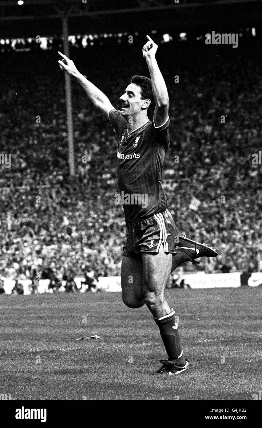 F l full length portrait arm s raised celebrating sport football hi-res ...