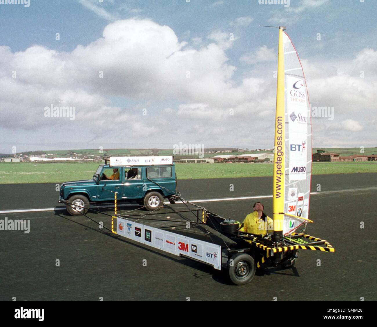 GOSS/catamaran 02. Pete Goss with a tenth scale engineering replica of ...