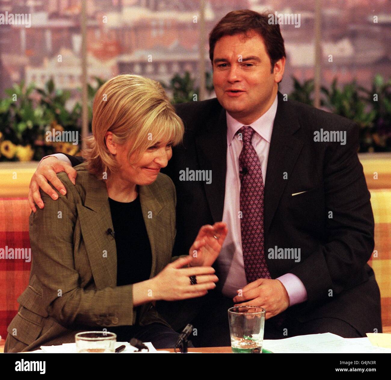 GMTV presenter Fiona Phillips shares a joke with co-host Eamonn Holmes ...