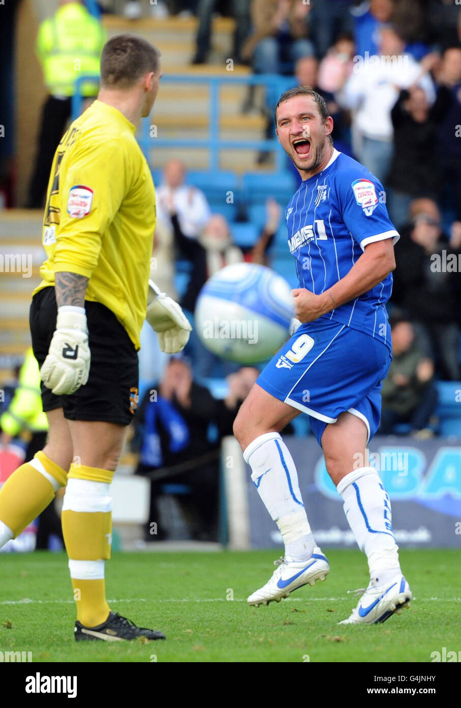 Gillingham's Danny Kedwell celebrates scoring from the penalty spot ...