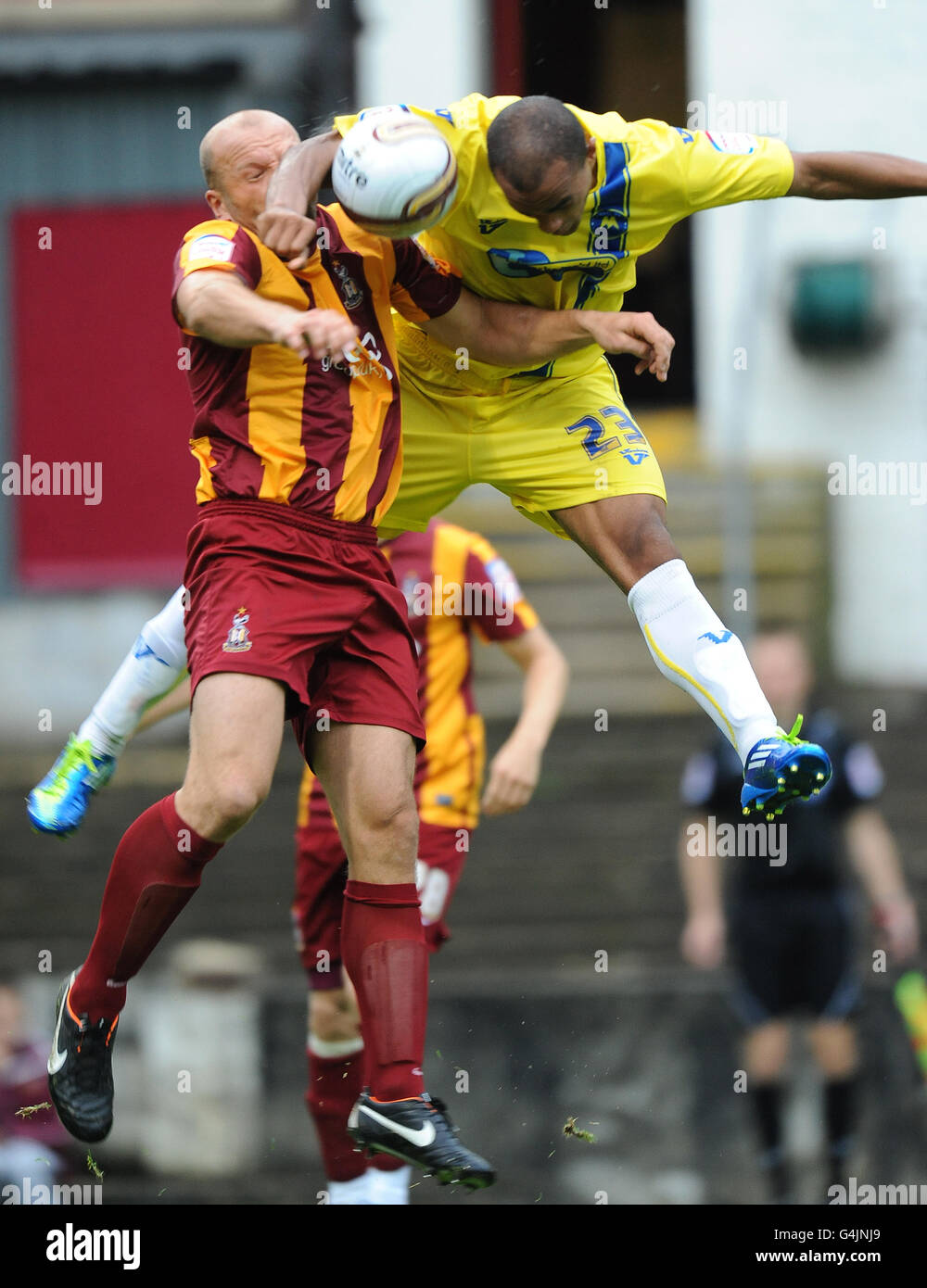Bradford citys guy branston and torquay uniteds taiwo atieno hi-res ...