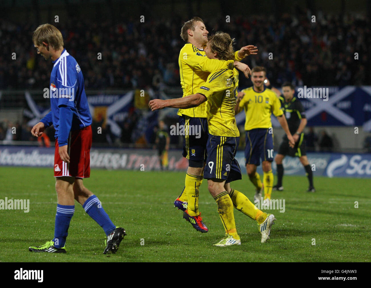 Scotland's Craig Mackail-Smith (right) celebrates his goal with Barry ...