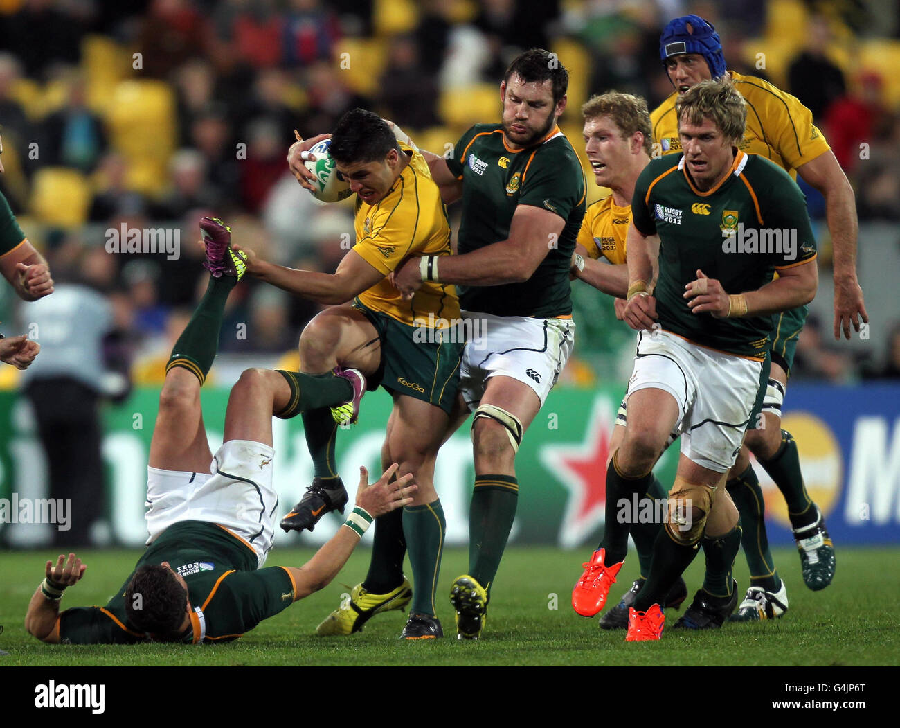 Australia's Anthony Faingaa (centre left) is tackled by South Africa's ...
