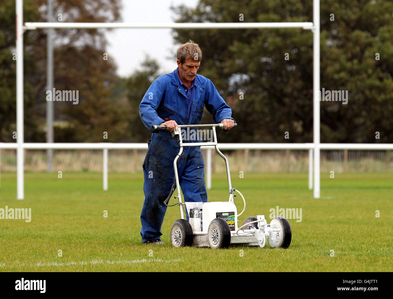 Falkirk Rugby Club groundsman Bill Arkley lines the pitch after ...