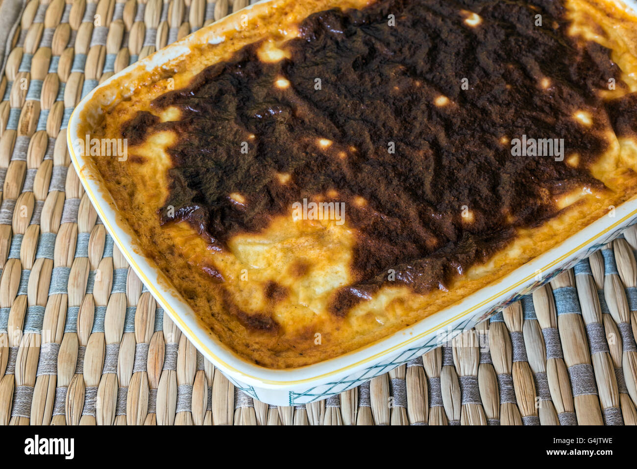 Homemade moussaka in white roasting pan Stock Photo - Alamy