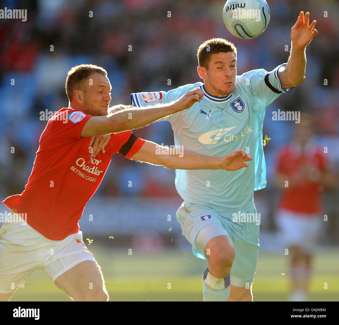Coventry City's Lukas Jutkiewicz and Nottingham Forest's Luke Chambers ...