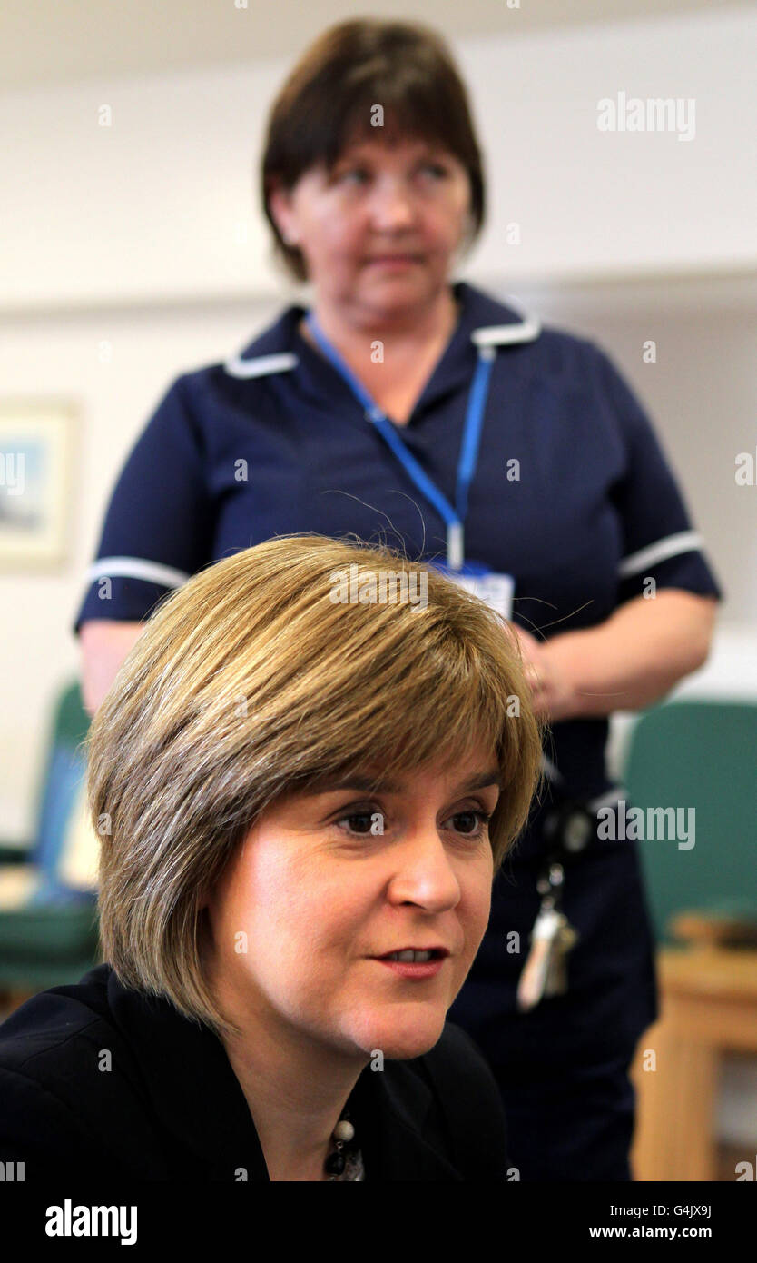 Scottish Health Secretary Nicola Sturgeon (bottom) chats to senior ...