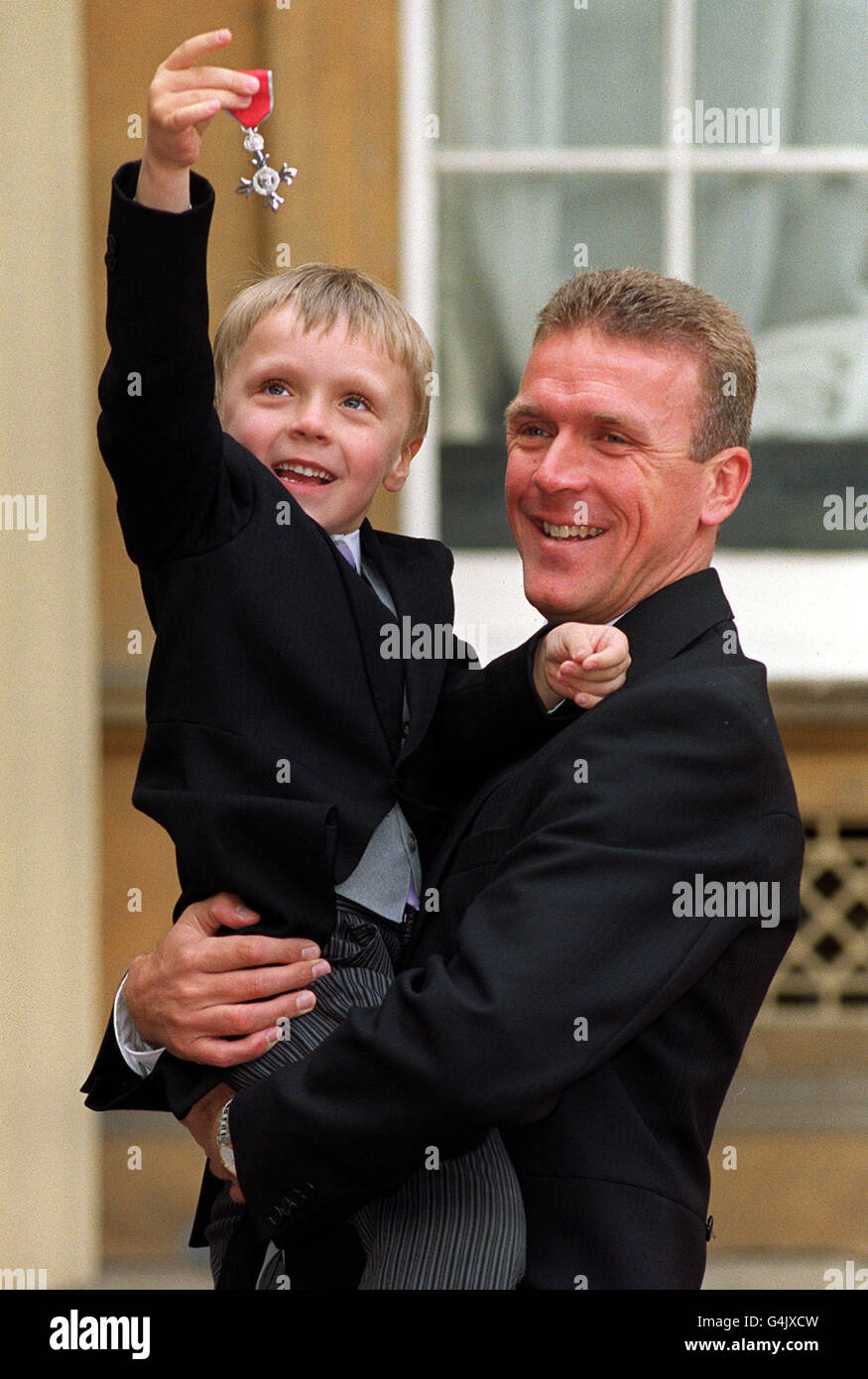 Alec Stewart & son/investiture Stock Photo - Alamy