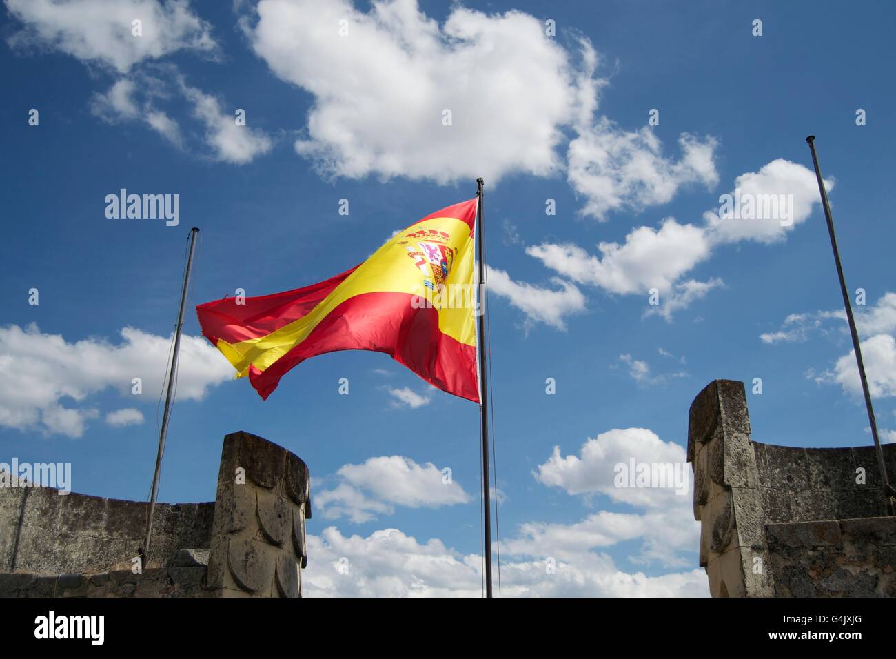 Spanish flag fluttering on top of Segovia castle Stock Photo - Alamy