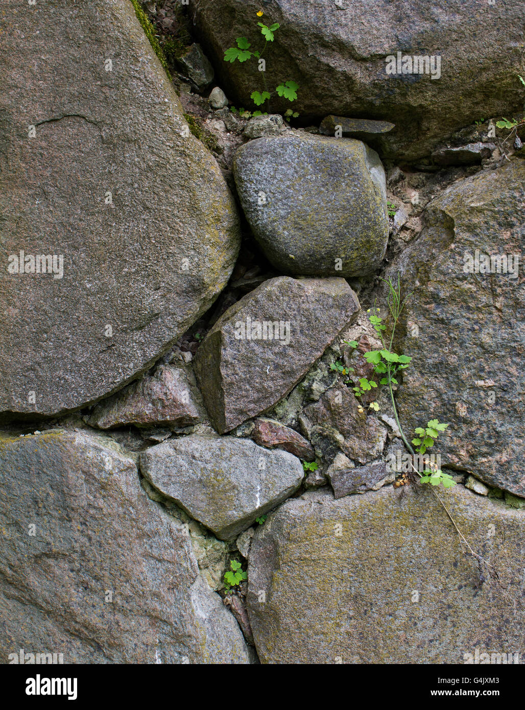 The structure of the old stone wall close up for a retro background ...