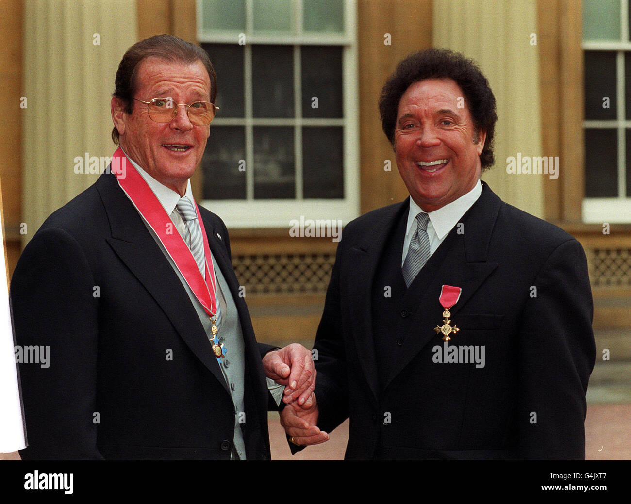 James Bond actor Roger Moore (left) with Welsh singer Tom Jones at ...