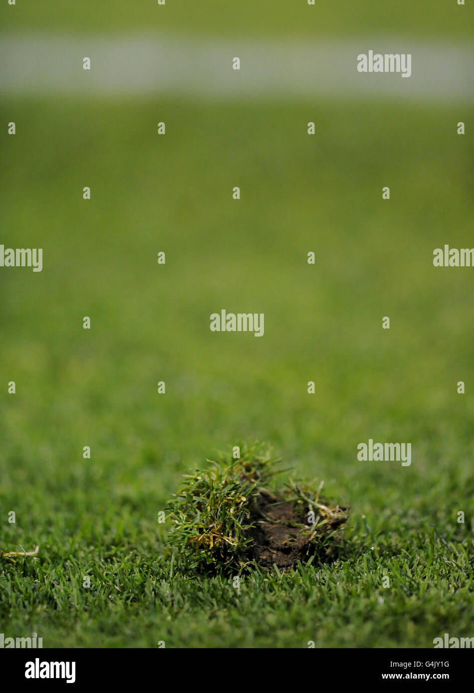 General view of a lump of turf on the pitch hi-res stock photography ...