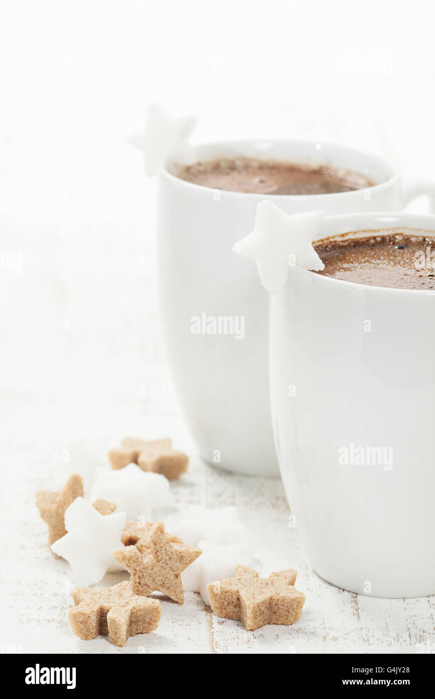 Two coffee cups on white background Stock Photo - Alamy