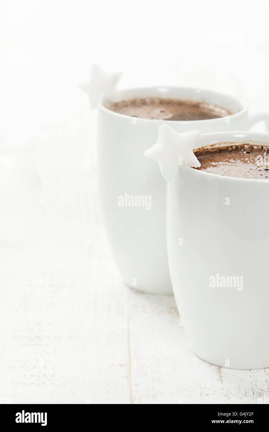 Two coffee cups on white background Stock Photo - Alamy