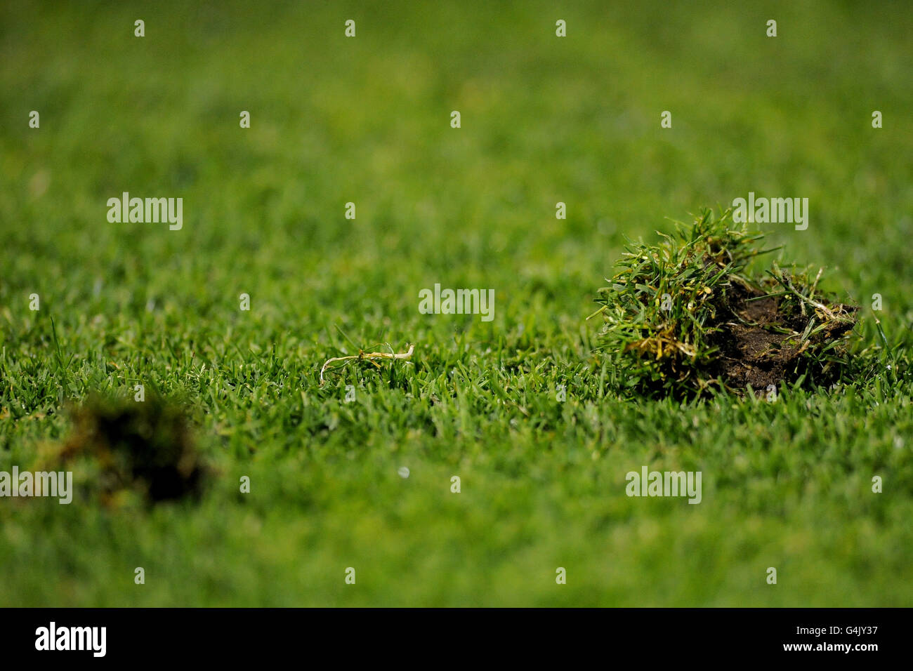 General view of a lump of turf on the pitch hi-res stock photography ...