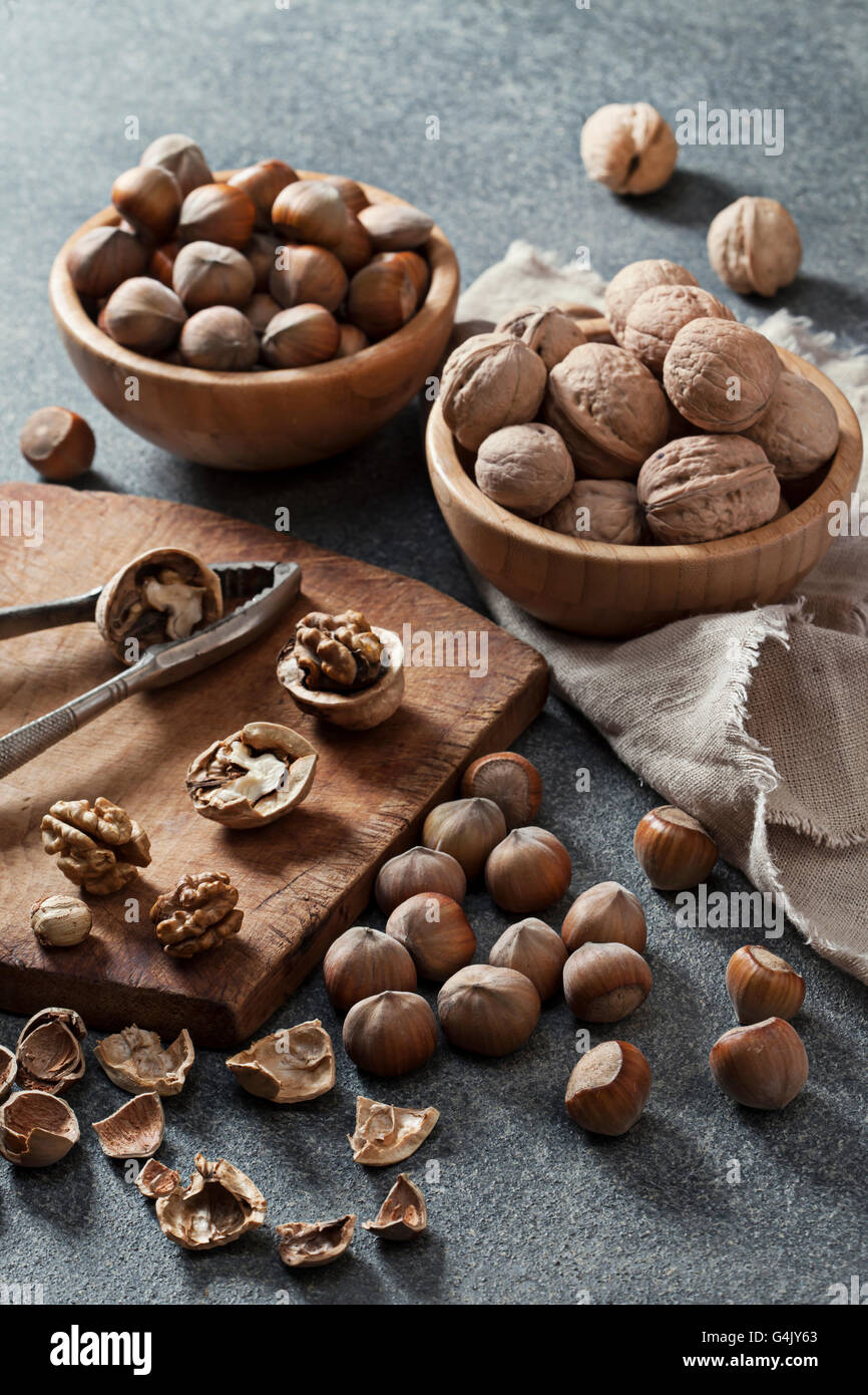 Nuts on stone background Stock Photo - Alamy
