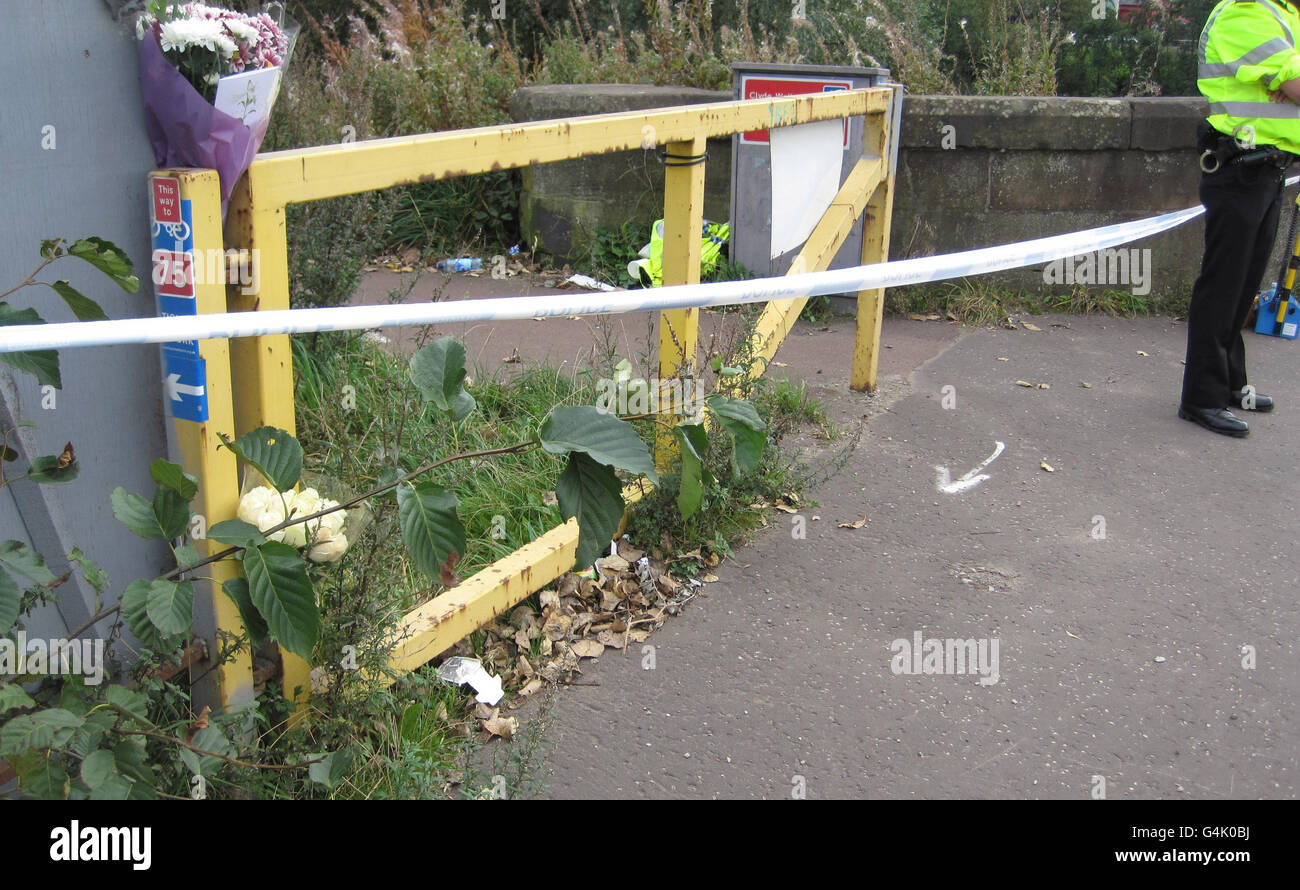 Flowers left near the scene where the body of Brian Faulds, 29, was ...