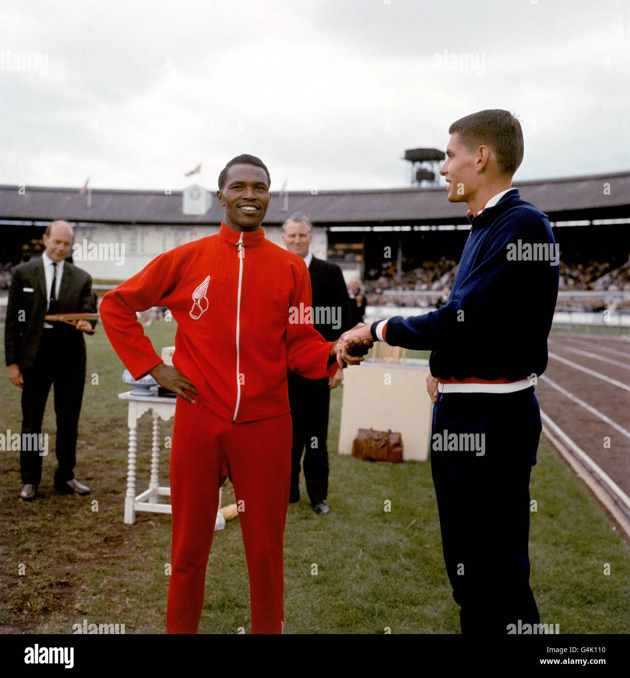L r kenyas kip keino shakes hands with usas jim ryun hi-res stock ...