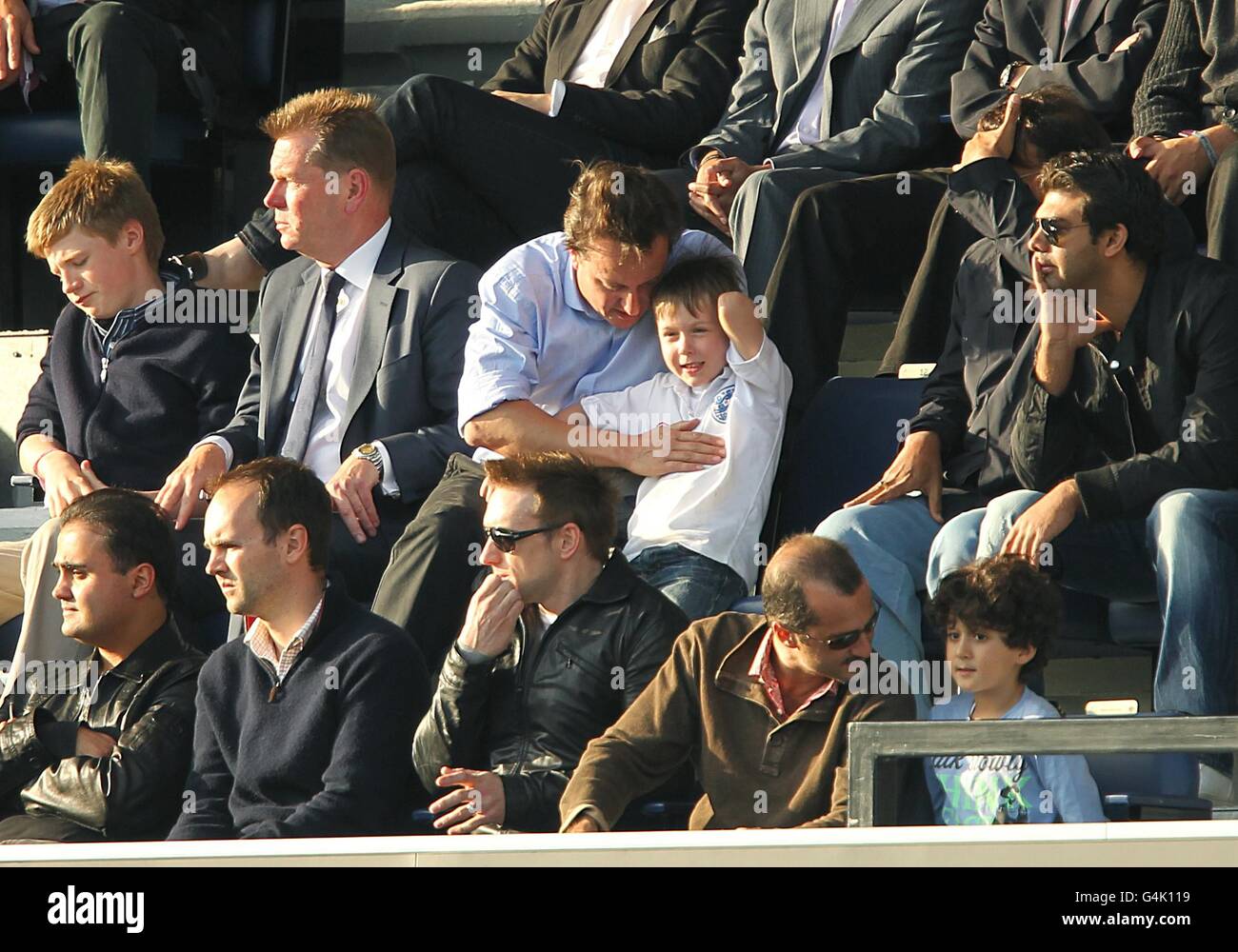 Prime Minister David Cameron in the stands with his son Arthur Stock ...