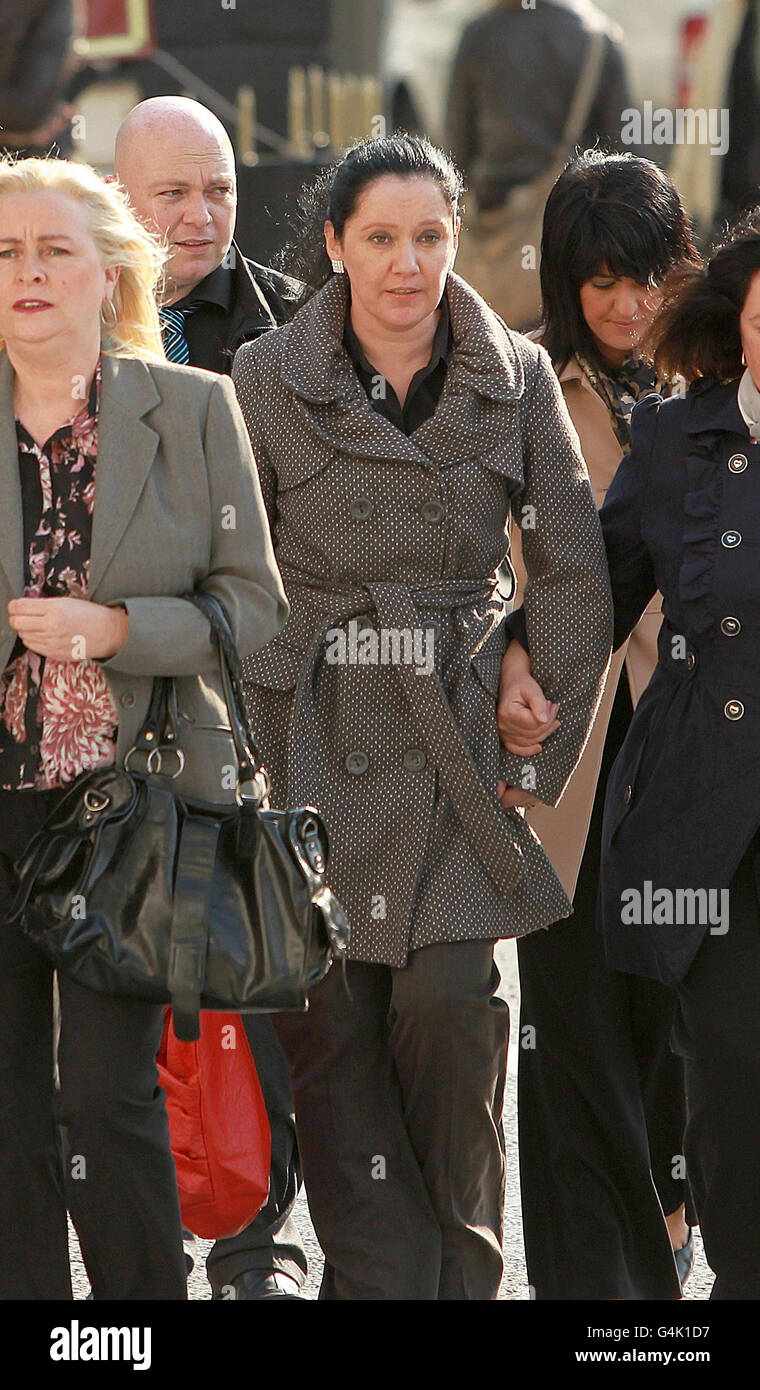 Aine Tyrell (centre), daughter of Liam Adams, arrives at court in ...