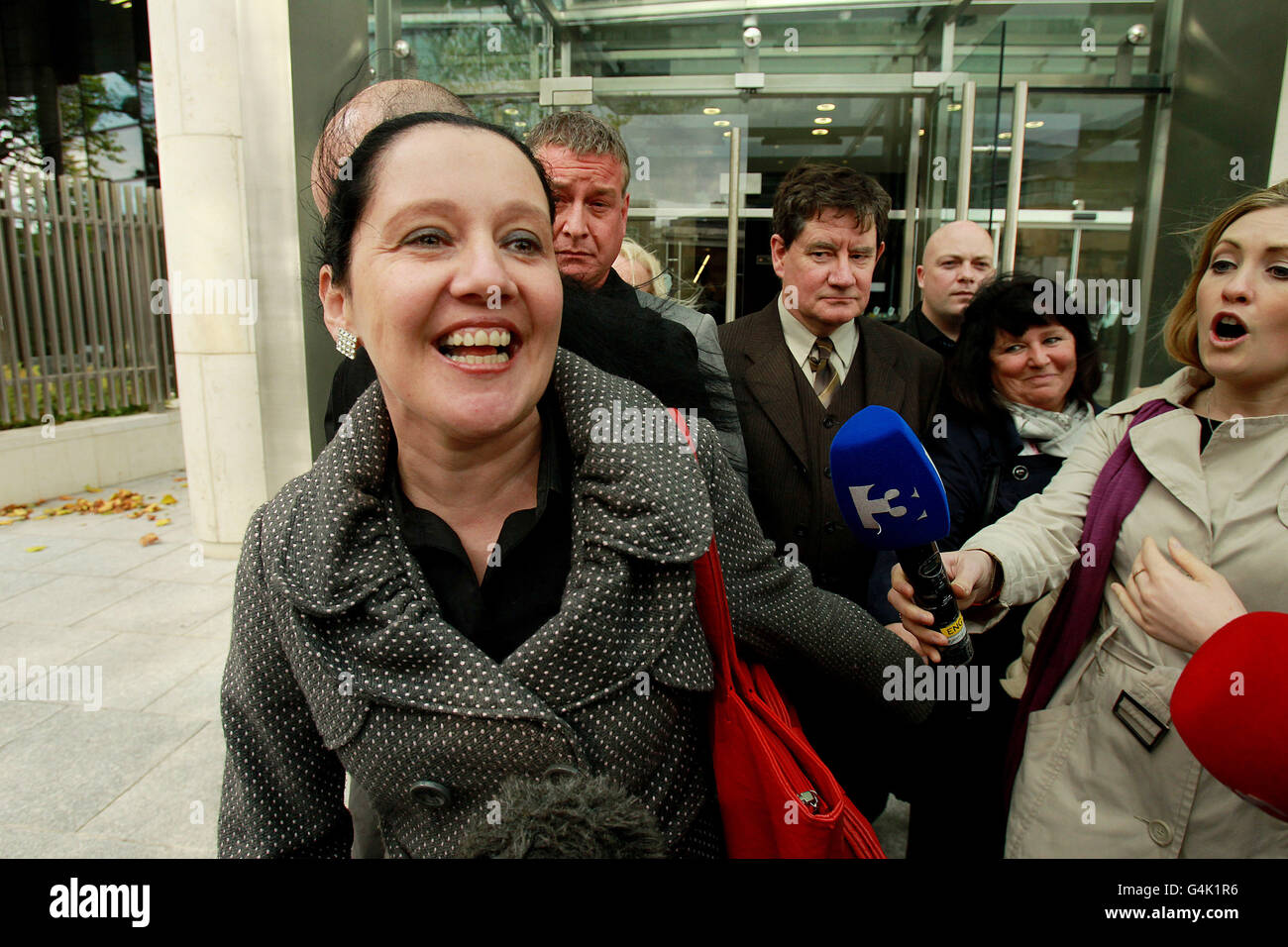Aine Tyrell, daughter of Liam Adams speaks to the media outside court ...