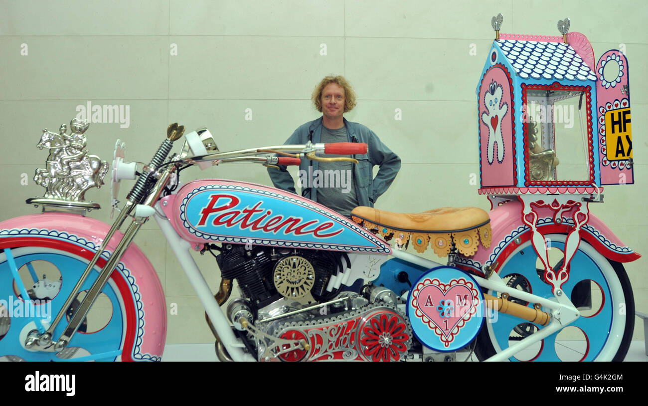 Artist Grayson Perry poses with his Kenilworth AM1 motorcycle, at the ...
