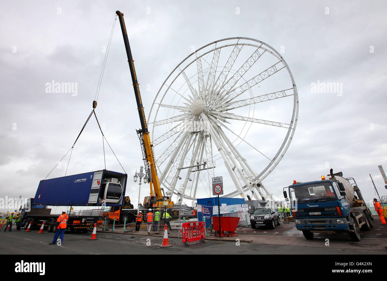 Construction gets under way on the eye-catching 170ft-high Ferris wheel ...