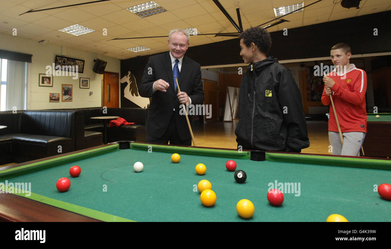 Presidential candidate Martin McGuinness plays a game of Snooker with ...