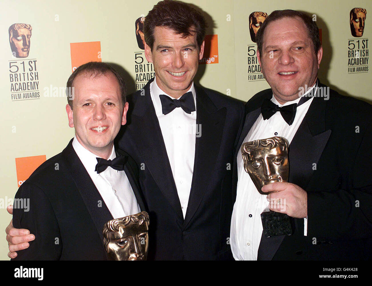 From left to right, David Parfitt, Pierce Brosnan (who presented the ...