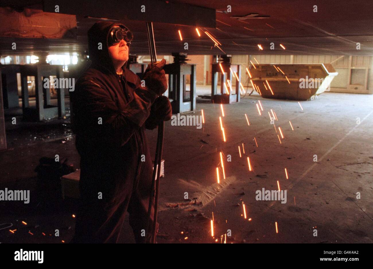Fabricator Alec Hutchison at work in the Kvaerner Govan shipbuilding ...