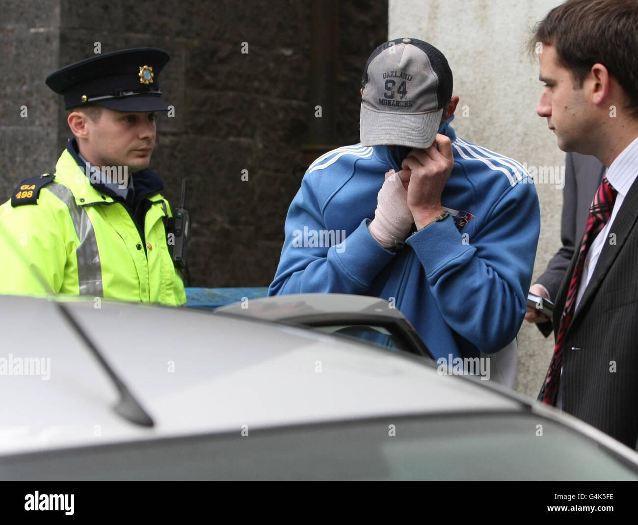 Fire arrest man on assault charge Stock Photo - Alamy