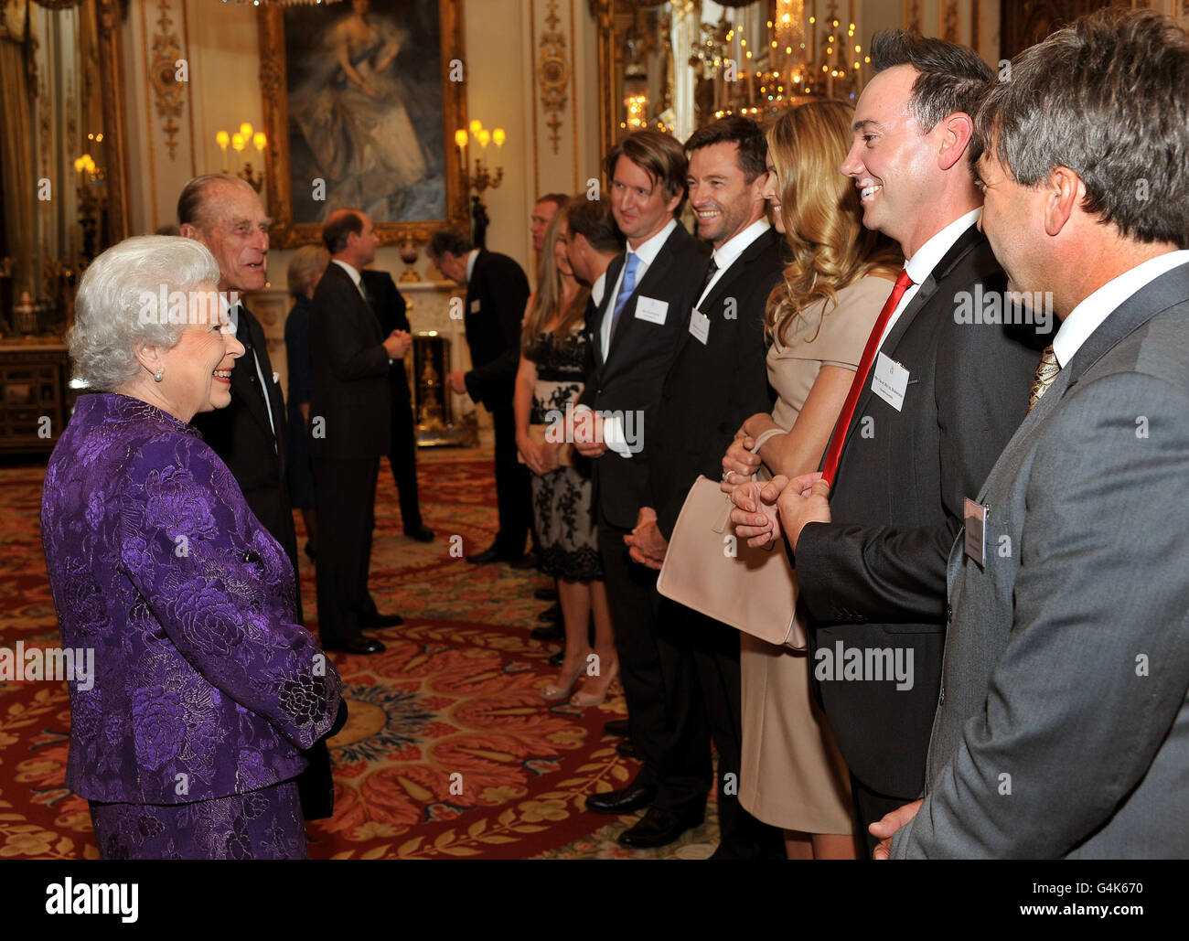 Queen Elizabeth II talks with Elle Macpherson and Craig Revel Horwood ...