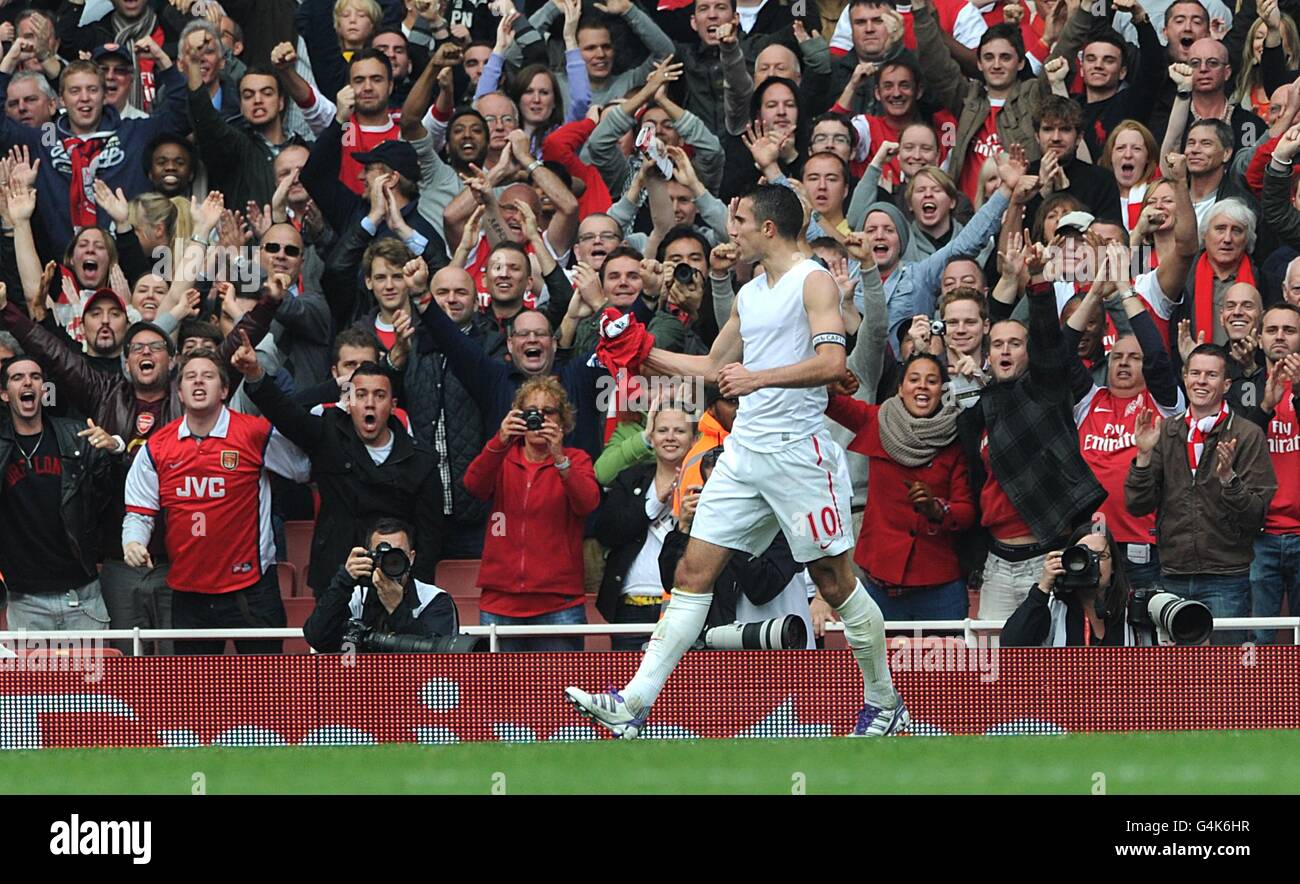 Arsenal's Robin Van Persie celebrates in front of the home fans after ...