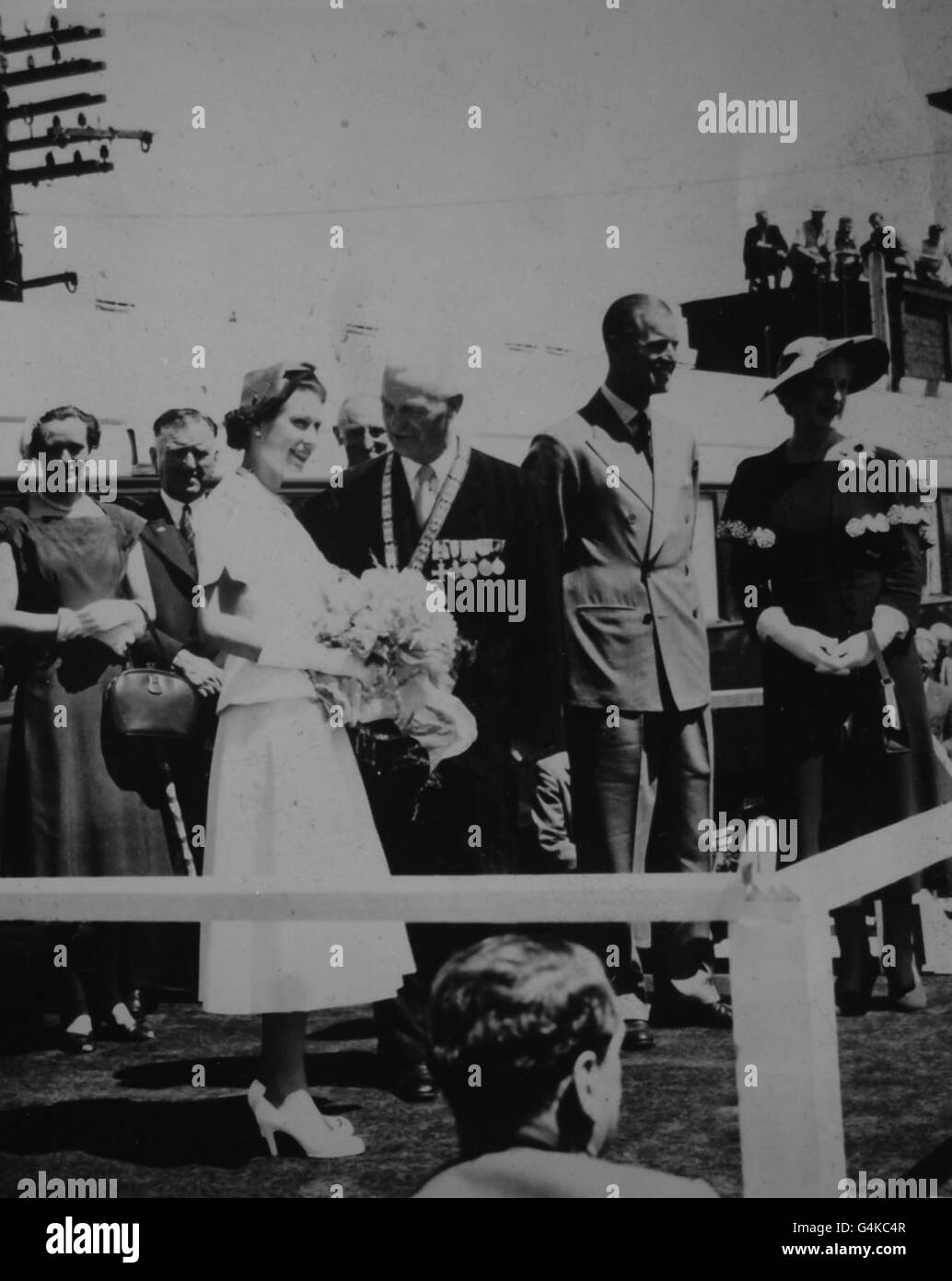 **Scanned low-res from contact** The Queen and Duke of Edinburgh smile ...