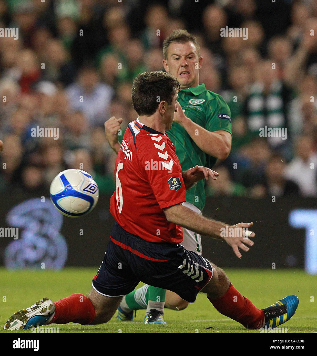 Republic of Ireland's Simon Cox has a shot at goal past Armenia's ...