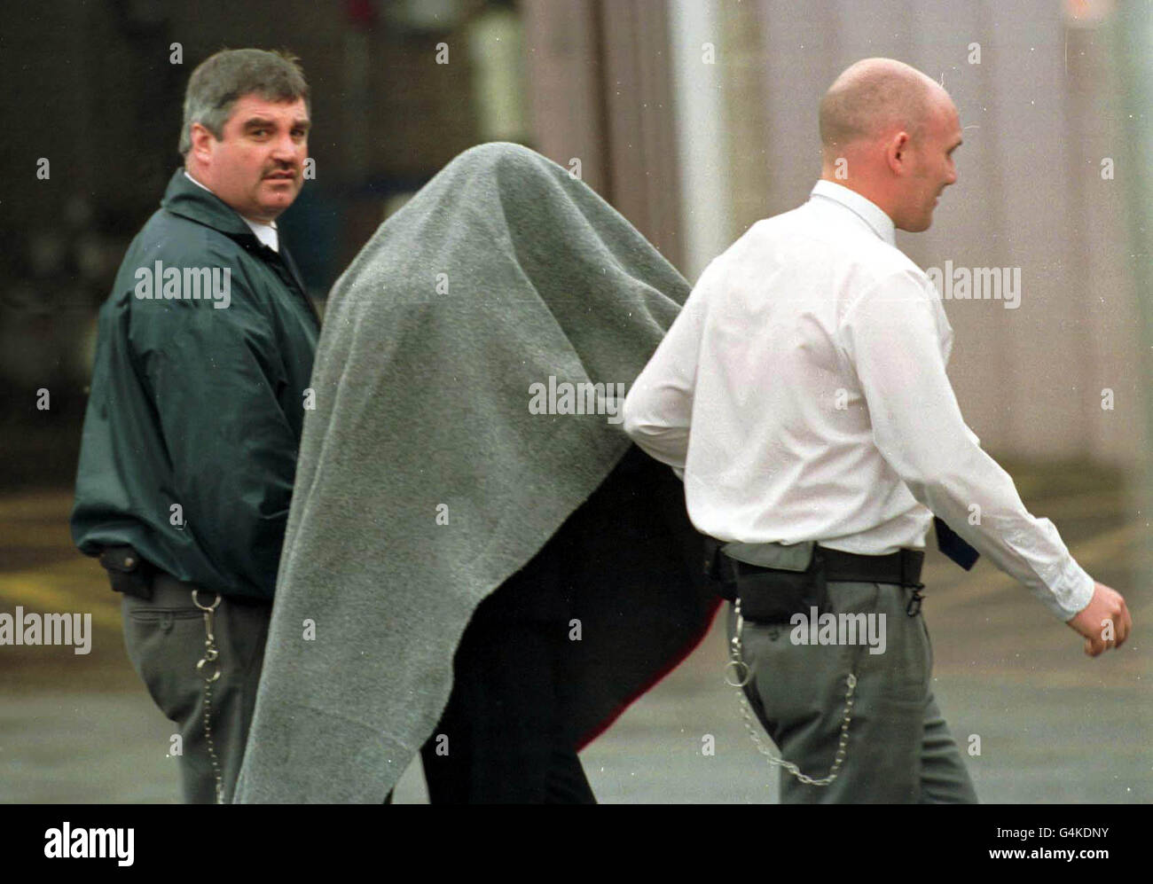 David Norris,(centre) one of the men connected to the investigation ...